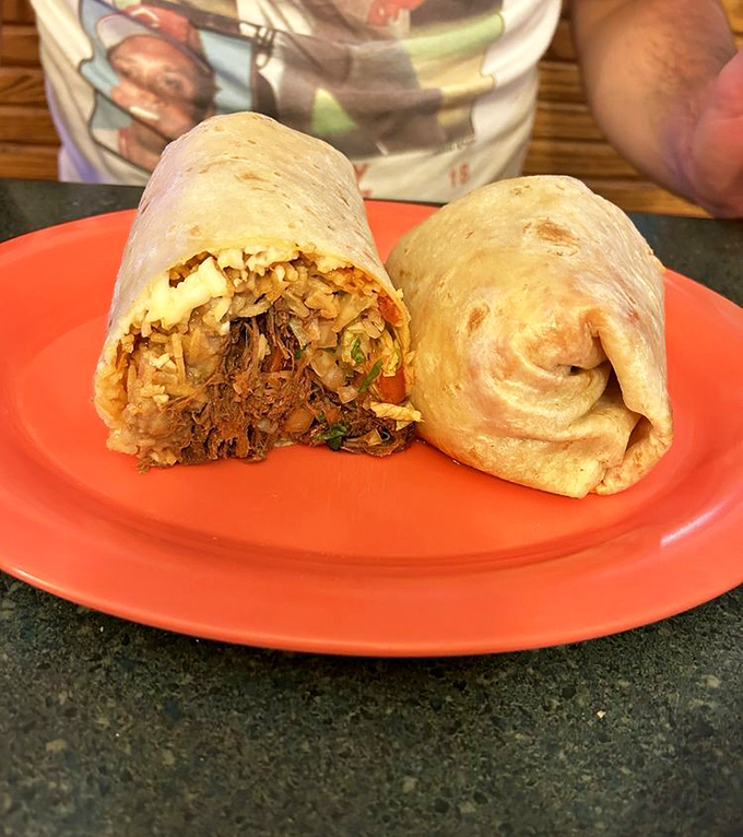 When barbacoa meets rice in a tortilla embrace, magic happens. This isn't just lunch; it's the comfort food hug you didn't know you needed.