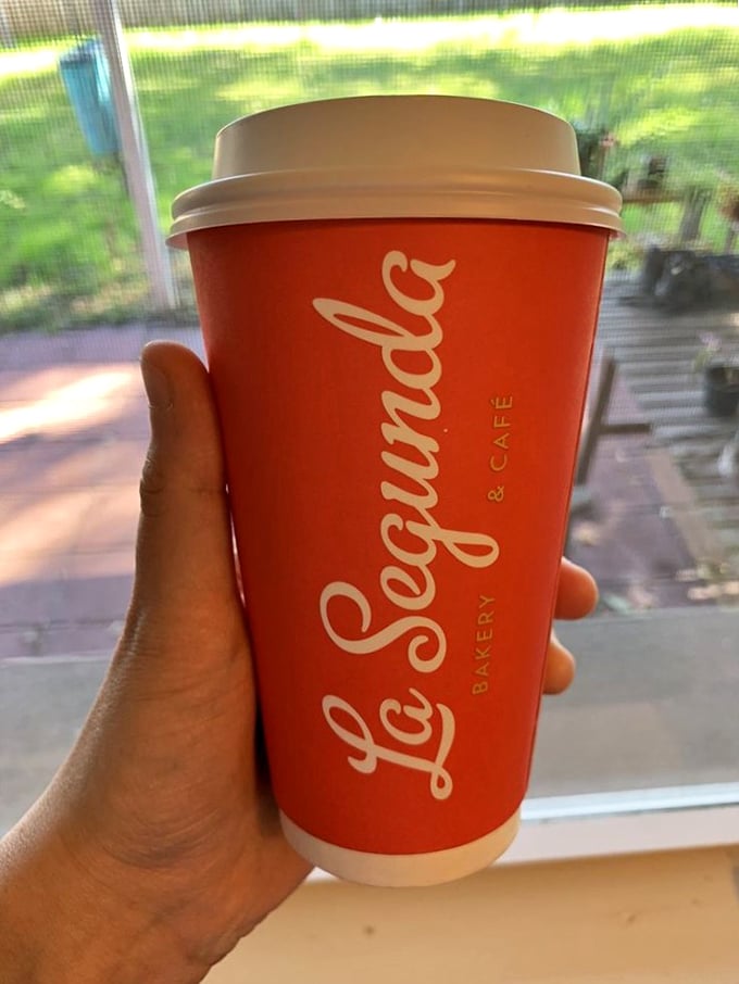 The caf&eacute; con leche comes in a signature coral cup that says, "Yes, this is the real deal," and yes, it will ruin all other coffee experiences for you.