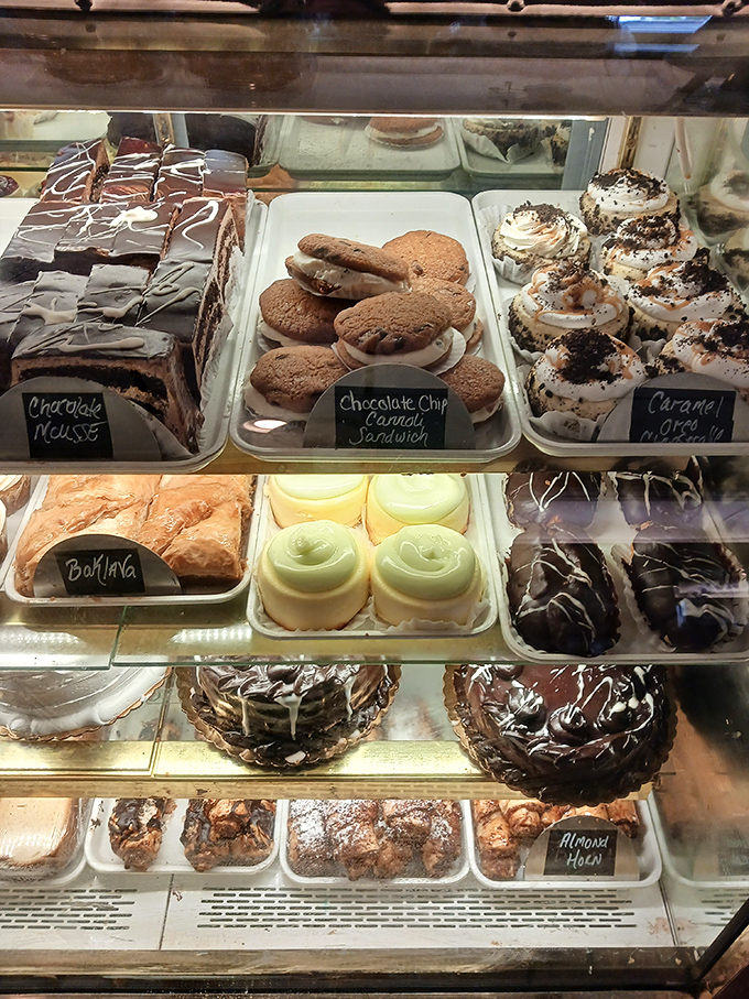 The dessert case &ndash; where willpower goes to die and "I'll just have coffee" transforms into "I'll have that chocolate thing and no regrets." 