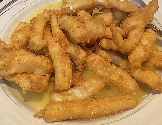 Crispy, golden perfection swimming in butter sauce&mdash;these calamari don't need gimmicks, just a squeeze of lemon and good company.
