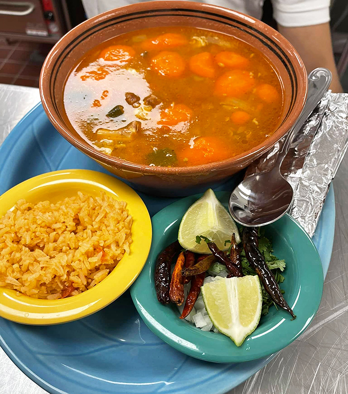 This Caldo Tlalpe&ntilde;o isn't just soup&mdash;it's a warm hug in a bowl, with those roasted peppers on the side standing by like spicy little bodyguards.