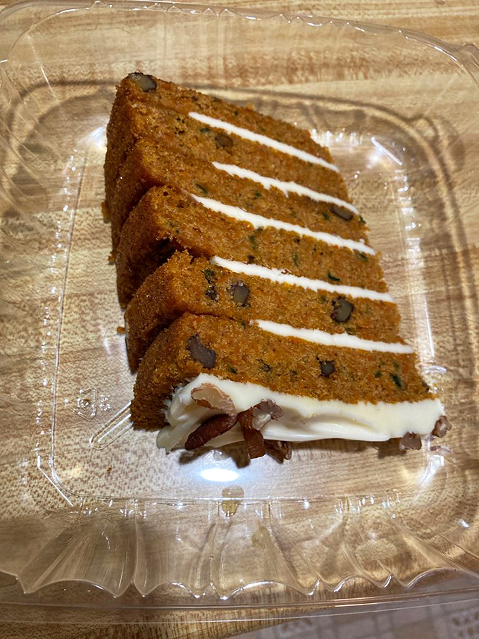 Layers of moist carrot cake with cream cheese frosting tell a story of dessert perfection. No rabbit could resist.