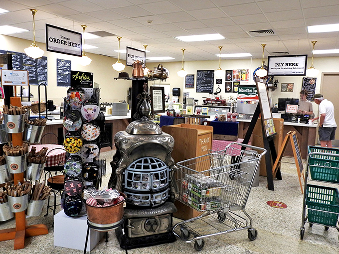 That vintage potbelly stove near the checkout isn't just decorative; it's silently judging your modern heating system's lack of character.
