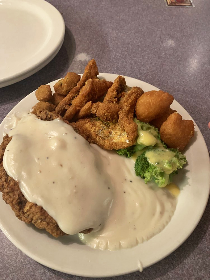 Golden-fried catfish and crispy sides&mdash;the kind of plate that makes you want to high-five the chef and loosen your belt simultaneously.