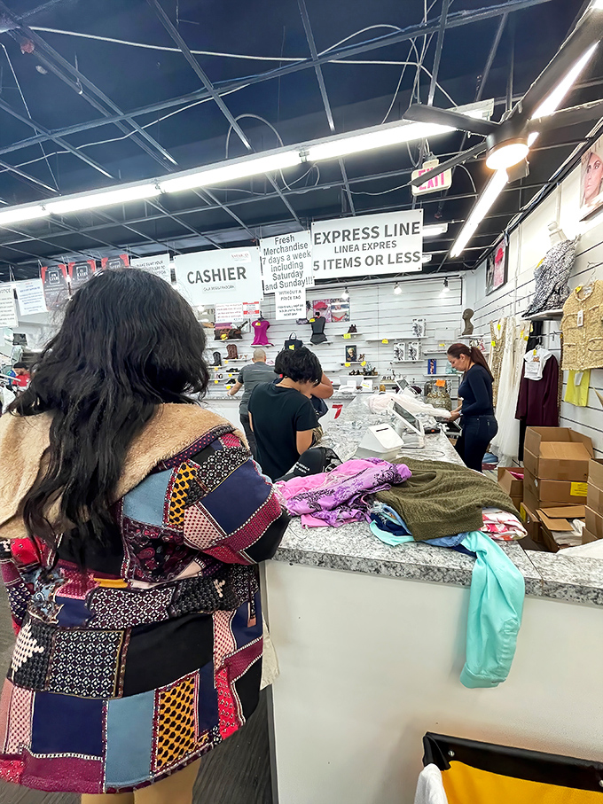 The checkout line&mdash;where triumphant shoppers clutch their treasures like contestants who've just won the final round of a game show.
