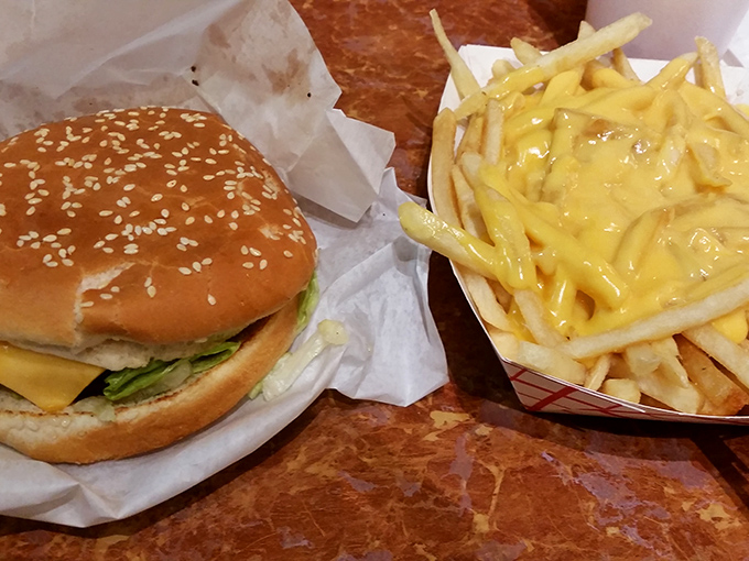 This isn't just a cheeseburger&mdash;it's what happens when simple ingredients receive the respect they deserve, with cheese fries that defy gravity.