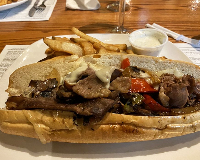 A proper cheesesteak that doesn't need Philadelphia's permission to be magnificent, with peppers and onions playing the perfect supporting roles.