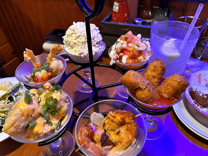 This isn't just an appetizer tower&mdash;it's a vertical seafood playground where each tiny bowl offers a different delicious adventure.
