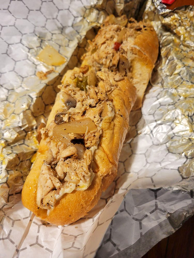 A chicken cheesesteak that would make even beef loyalists question their allegiance. Those caramelized onions aren't just ingredients&mdash;they're game changers.