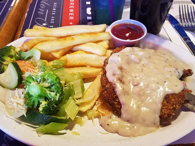 Country-fried steak smothered in gravy that your grandmother would approve of, with a fresh salad pretending you're making healthy choices.