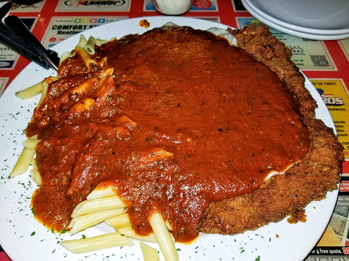 Chicken Parmesan that could make your Italian grandmother weep with joy. The sauce-to-cheese ratio achieves mathematical perfection.
