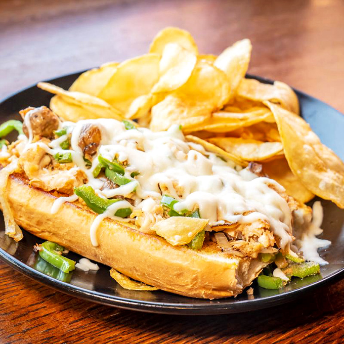 A chicken philly that bridges the gap between sandwich and indulgence, with melted cheese cascading over tender meat. Napkins required, regrets impossible.