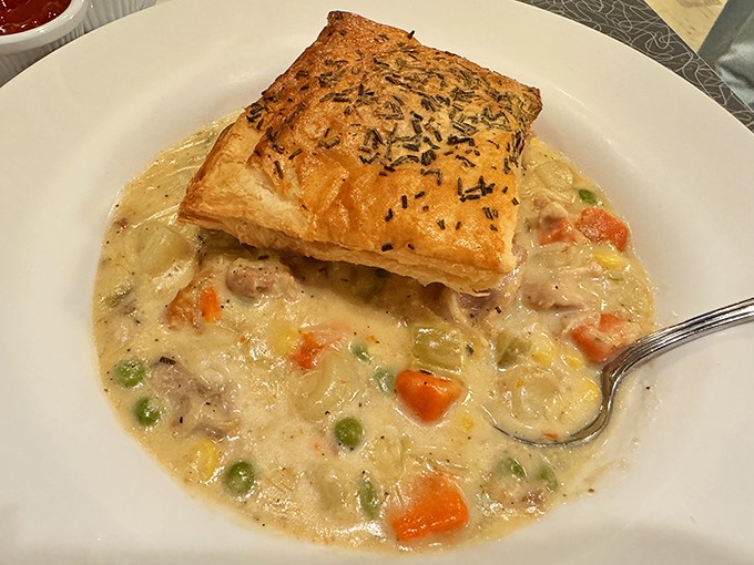 Grandpa Jean's chicken pot pie isn't hiding anything under that golden pastry roof except pure, creamy comfort that tastes like childhood.