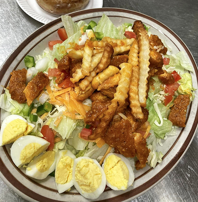 Garden-fresh greens, hard-boiled eggs, and crispy chicken create a salad that even salad-skeptics would cross county lines for.
