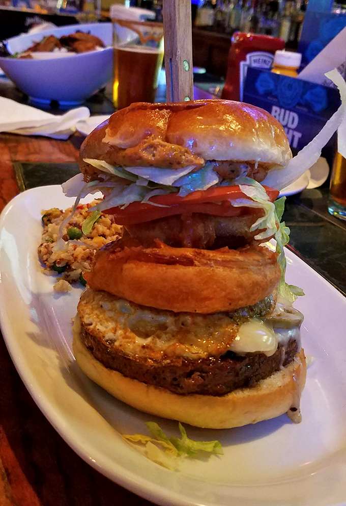 This towering achievement in sandwich architecture requires both hands, a healthy appetite, and possibly a signed liability waiver.