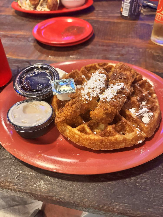 Breakfast meets dinner in this sweet-savory masterpiece. Crispy chicken tenders atop a golden waffle&mdash;proof that some relationships are meant to be.