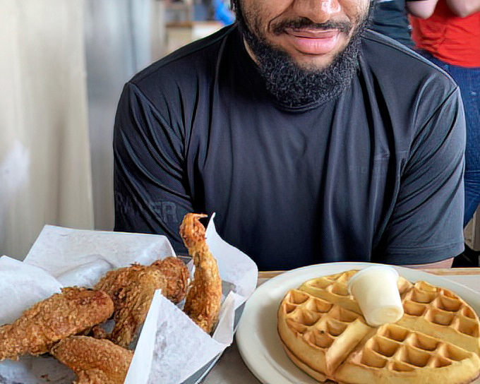Chicken and waffles: the breakfast equivalent of a power couple, proving that opposites don't just attract&mdash;they create culinary magic.