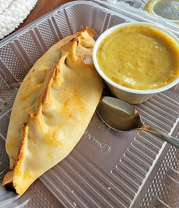This isn't just a pasty&mdash;it's a portable feast of savory filling wrapped in flaky pastry with curry sauce standing by for dunking duty.