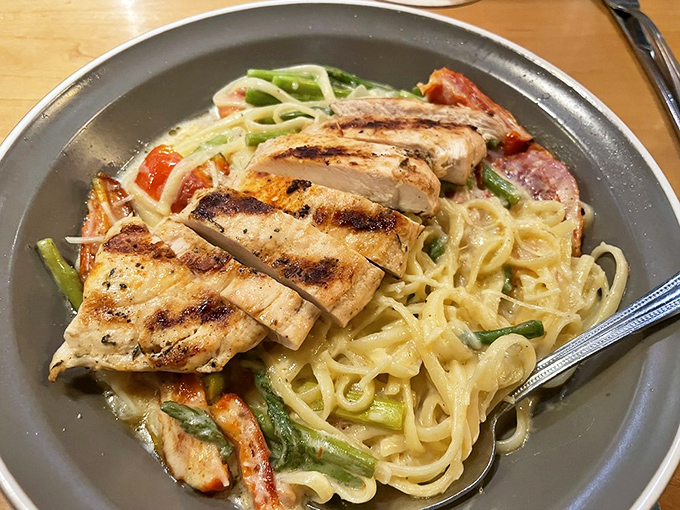 Not just a beer joint&mdash;this pasta proves Squatters has range. Grilled chicken atop creamy fettuccine with fresh vegetables shows their culinary chops.