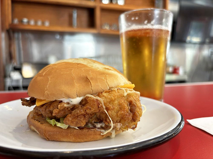The perfect chicken sandwich doesn't exi&mdash;wait, there it is! Crispy, juicy, and ready for its close-up on a humble white plate.
