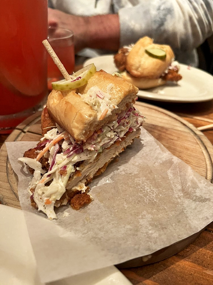 This chicken sandwich isn't just stacked&mdash;it's architected. The slaw provides structural integrity while delivering a perfect crunch-to-cream ratio.