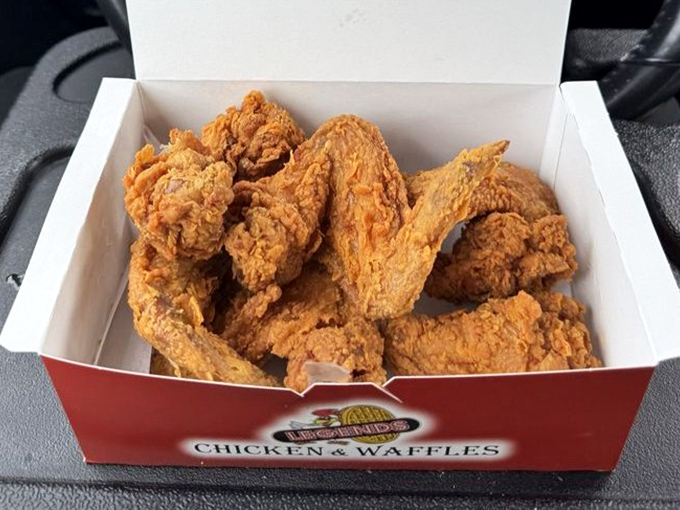 This red box contains what philosophers call "happiness in tangible form"&mdash;crispy wings with a batter so perfect it deserves its own hall of fame.