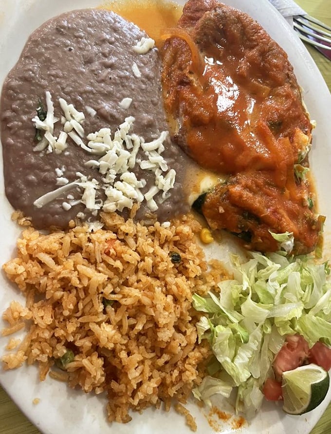 The chile relleno doesn't just share the plate &ndash; it commands it. That red sauce blanket tucked around the stuffed pepper is comfort food defined.