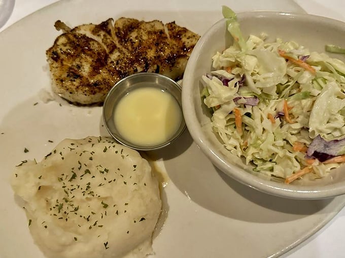 Perfectly grilled Chilean Sea Bass with vibrant green beans and whipped potatoes &ndash; simplicity that speaks volumes about quality ingredients.