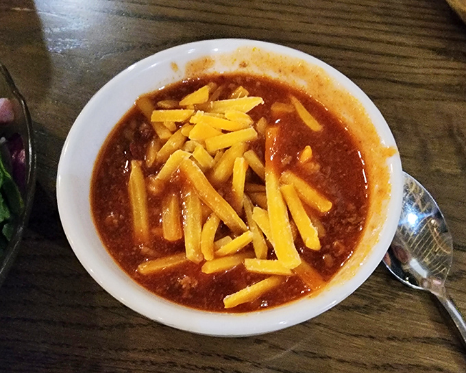 This isn't just chili&mdash;it's a bowl of warming tradition topped with generous shreds of cheddar, beckoning you like an old friend on a cold day.