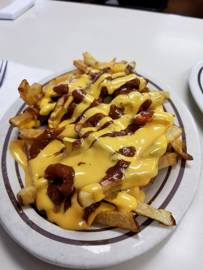 Chili cheese fries that could make a grown person weep tears of joy and question all previous life choices.