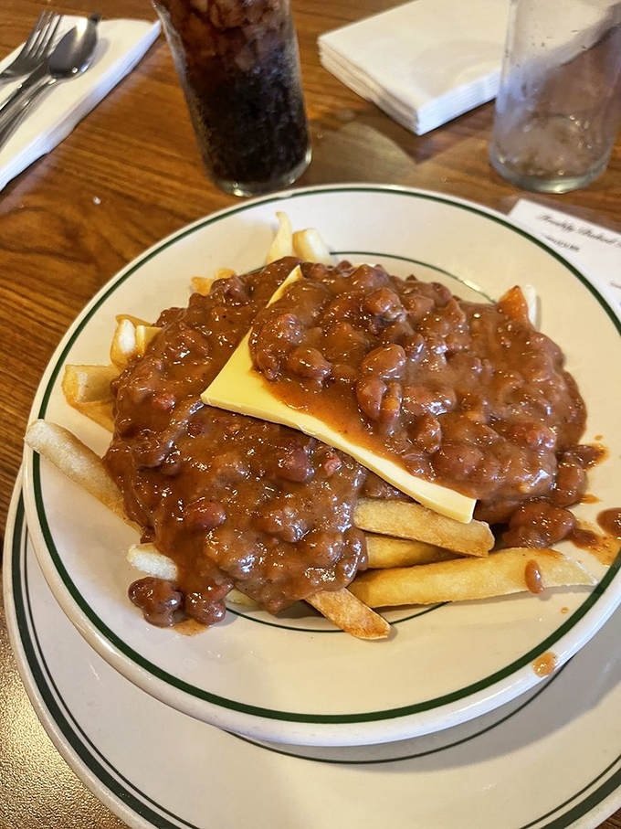 Chili cheese fries: where dignity goes to die and happiness comes to live. Worth every napkin and every minute on the treadmill tomorrow.