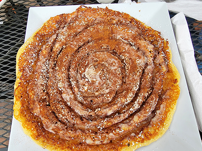 The cinnamon bun pancake&mdash;where breakfast meets dessert and nobody asks questions. That spiral of cinnamon sugar speaks a universal language of comfort.