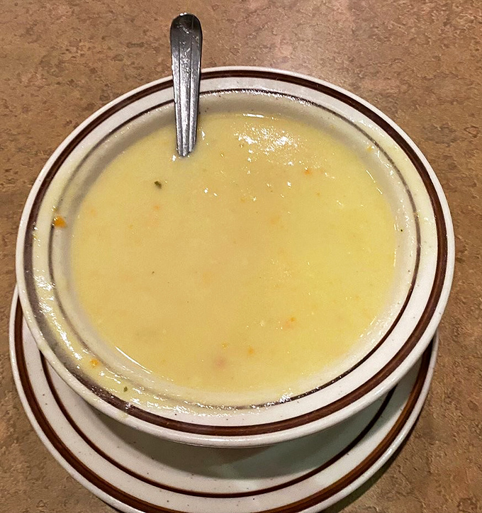 A bowl of liquid comfort that bridges New England and Florida. This clam chowder looks thick enough to stand a spoon in – the ultimate compliment.