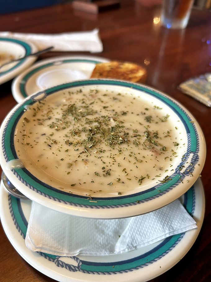 The legendary clam chowder&mdash;creamy, herb-flecked perfection that makes you wonder if mermaids might actually be the secret chefs.