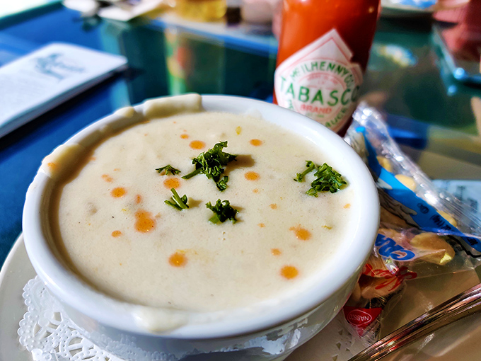 Clam chowder so authentic it should come with its own foghorn&mdash;creamy, hearty, and dotted with those little orange hot sauce freckles of joy.
