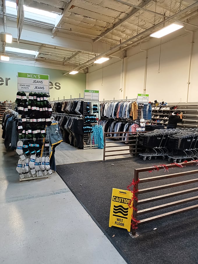 Men's clothing sections organized better than most people's sock drawers, spanning generations of style. 