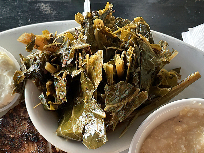 Southern tradition meets seafood haven. These collard greens aren't just a side dish—they're practically their own main event.