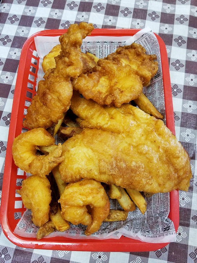 The combo platter that answers the eternal question: "Why choose?" A golden archipelago of fried delights that makes decision-making deliciously unnecessary.