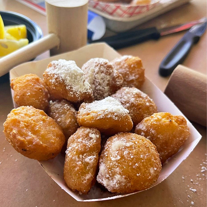 These powdered sugar-dusted corn fritters are what would happen if a donut and cornbread had a delicious baby at the Maryland shore.