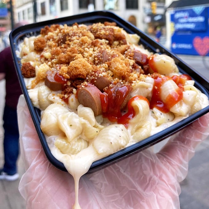 Cornbread crumbles crown this BBQ-drizzled creation like a savory tiara fit for cheese royalty.