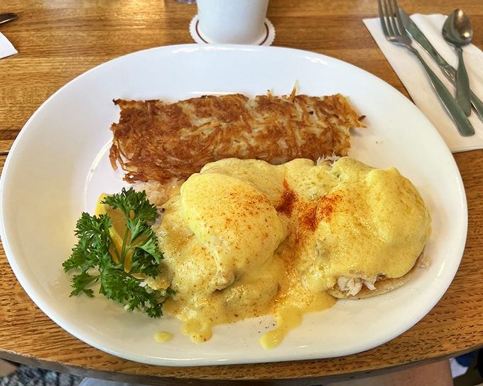 Eggs Benedict elevated to coastal royalty. The hollandaise sauce practically demands you write poetry about its velvety perfection.