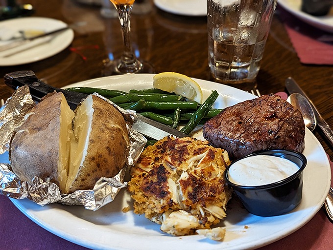 The ultimate surf and turf alliance: a Maryland-style crab cake bringing coastal flair to a steak that's been cooked with mathematical precision.