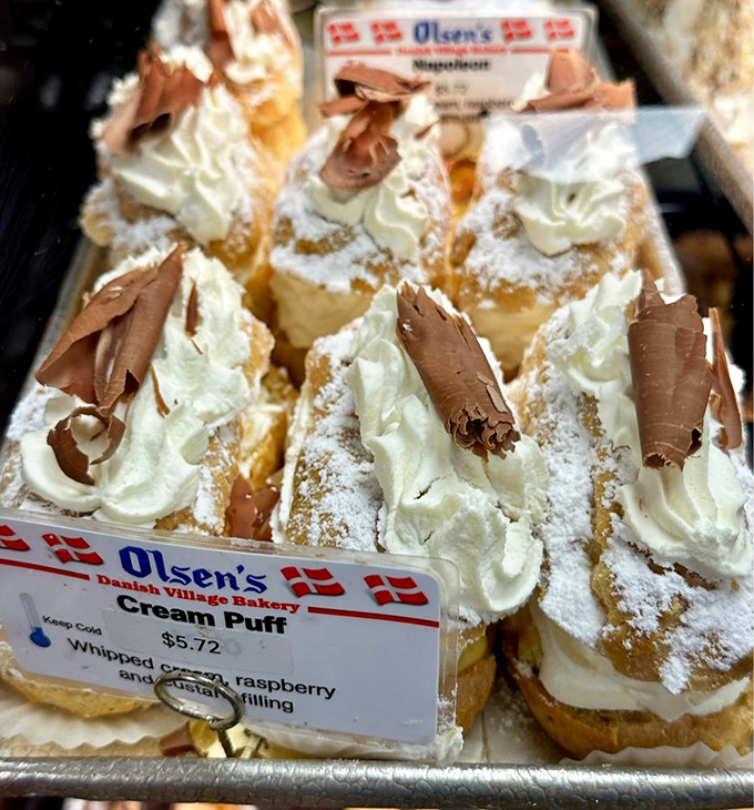 The legendary cream puffs&mdash;architectural marvels of pastry engineering filled with clouds of whipped cream and topped with chocolate curls. Dreams do come true.