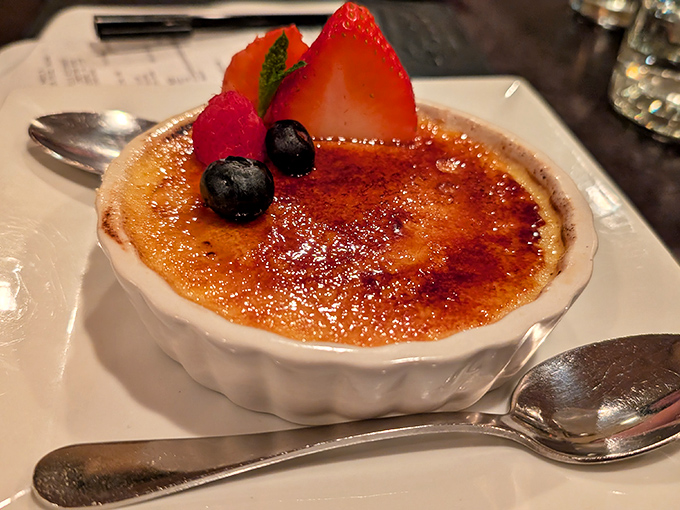 This cr&egrave;me br&ucirc;l&eacute;e with its perfectly torched top and fresh berries is basically dessert performing a standing ovation for your taste buds.