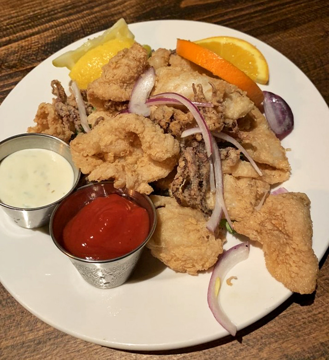 Calamari so perfectly fried it makes you wonder why anyone ever compared it to rubber bands. This is how the sea intended it.