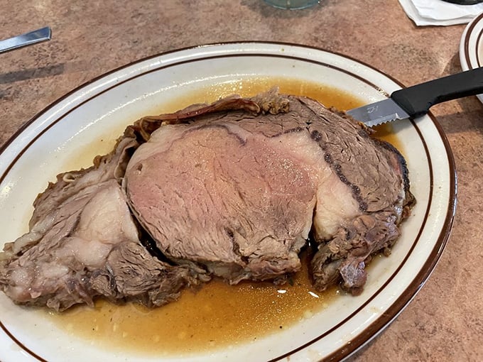 Prime rib so tender it practically surrenders to your knife. The au jus is basically liquid gold.