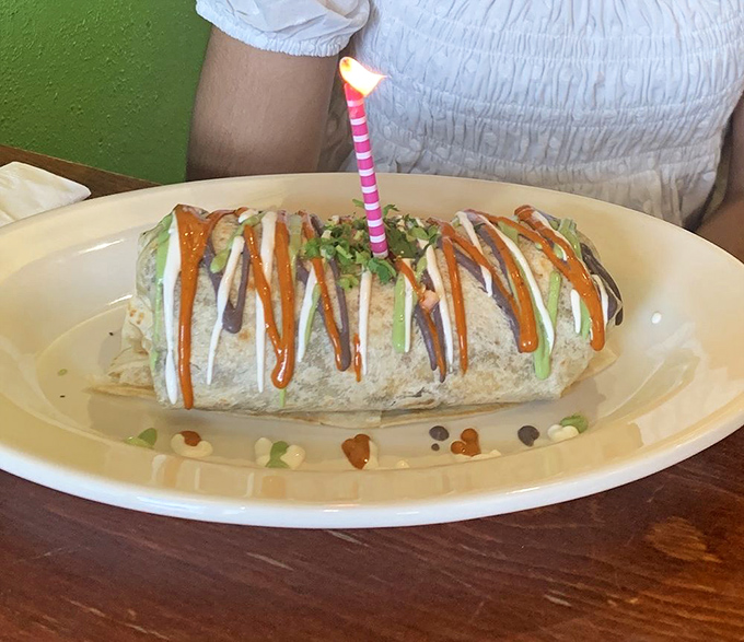 Someone's celebrating with this birthday burrito! When your dinner deserves a candle, you know you've found a place worth the subway ride.