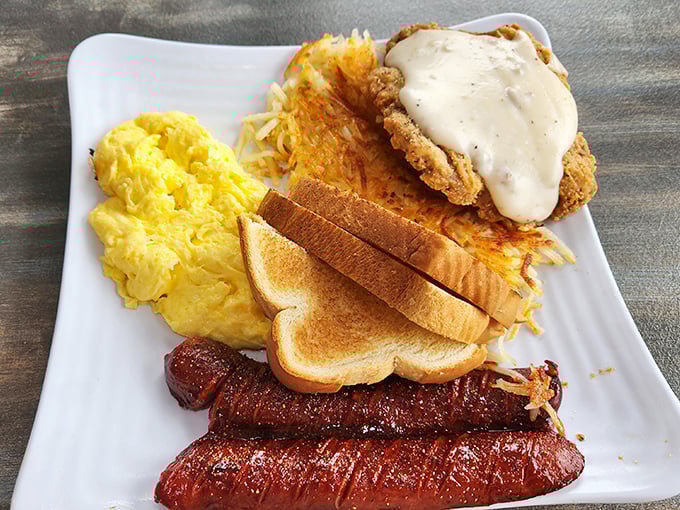 The breakfast plate that answers "Why choose?" with "You don't have to." Eggs, sausage, toast, and country-fried steak create the ultimate morning quartet.