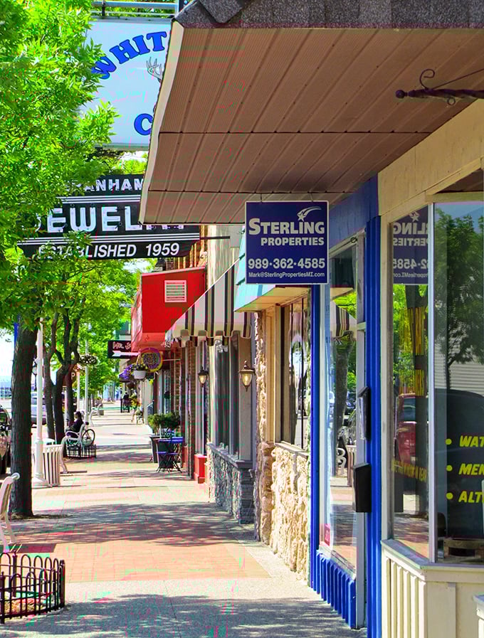Downtown's covered walkways invite leisurely strolling regardless of weather. The colorful storefronts each tell their own retail story.