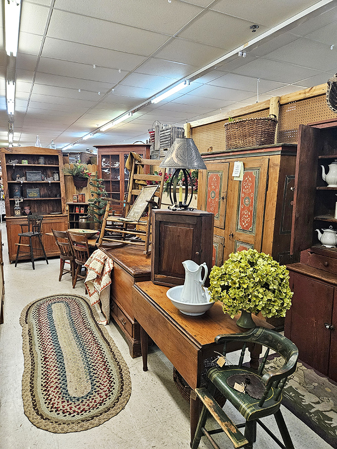 A furniture vignette that whispers "come sit awhile." That pitcher and braided rug could tell stories of Sunday suppers from another century.